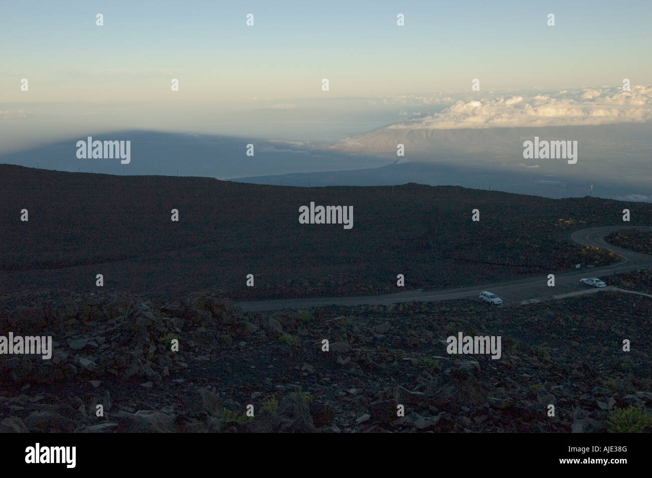Sunrise (dawn) and view of West Maui and Lanai seen from the summit of ...