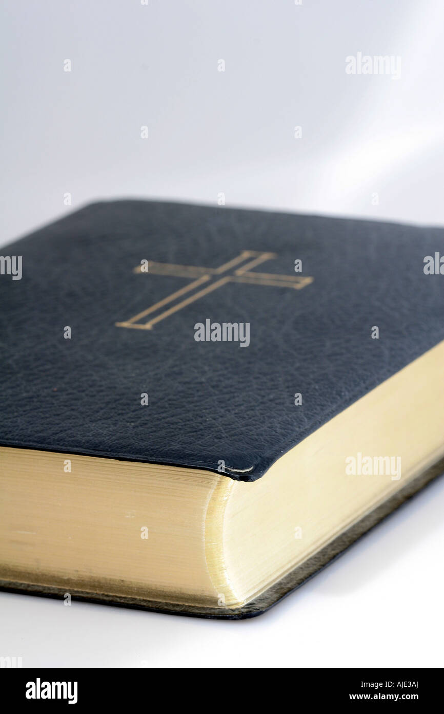 Holy bible well worn and read shot on white Stock Photo - Alamy