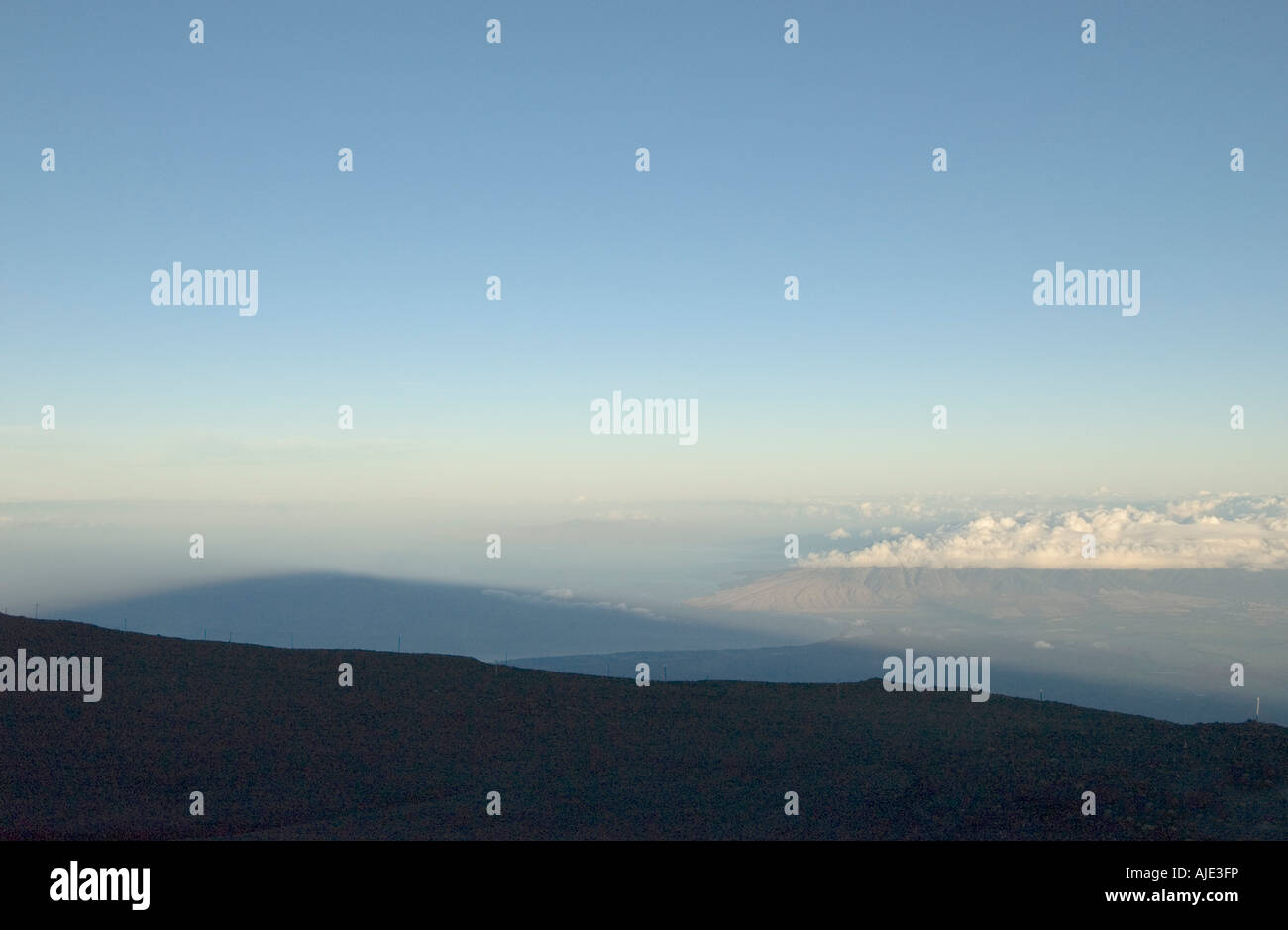 Sunrise (dawn) and view of West Maui and Lanai seen from the summit of ...