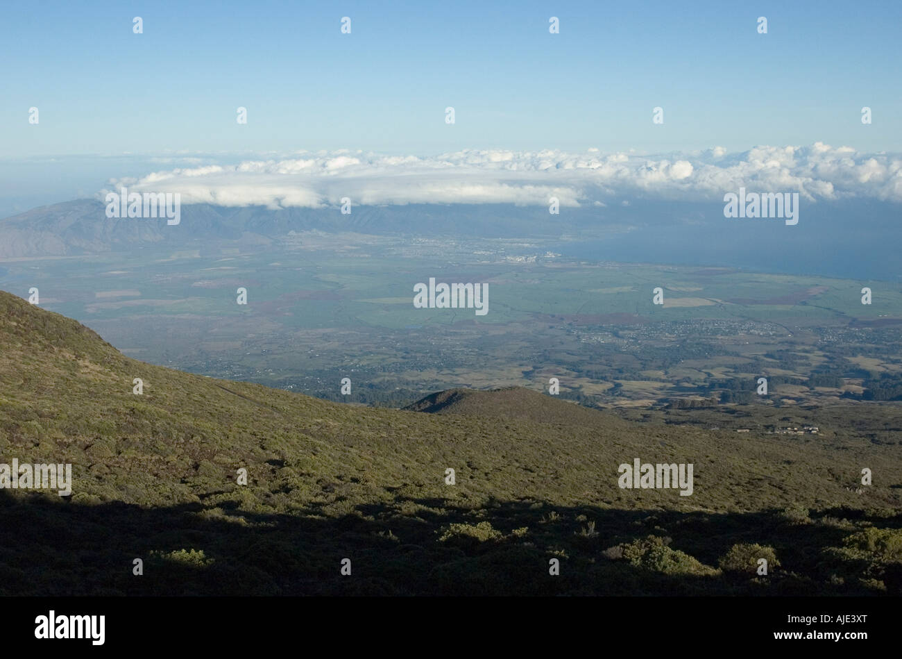 Sunrise (dawn) and view of West Maui and Lanai seen from the summit of ...