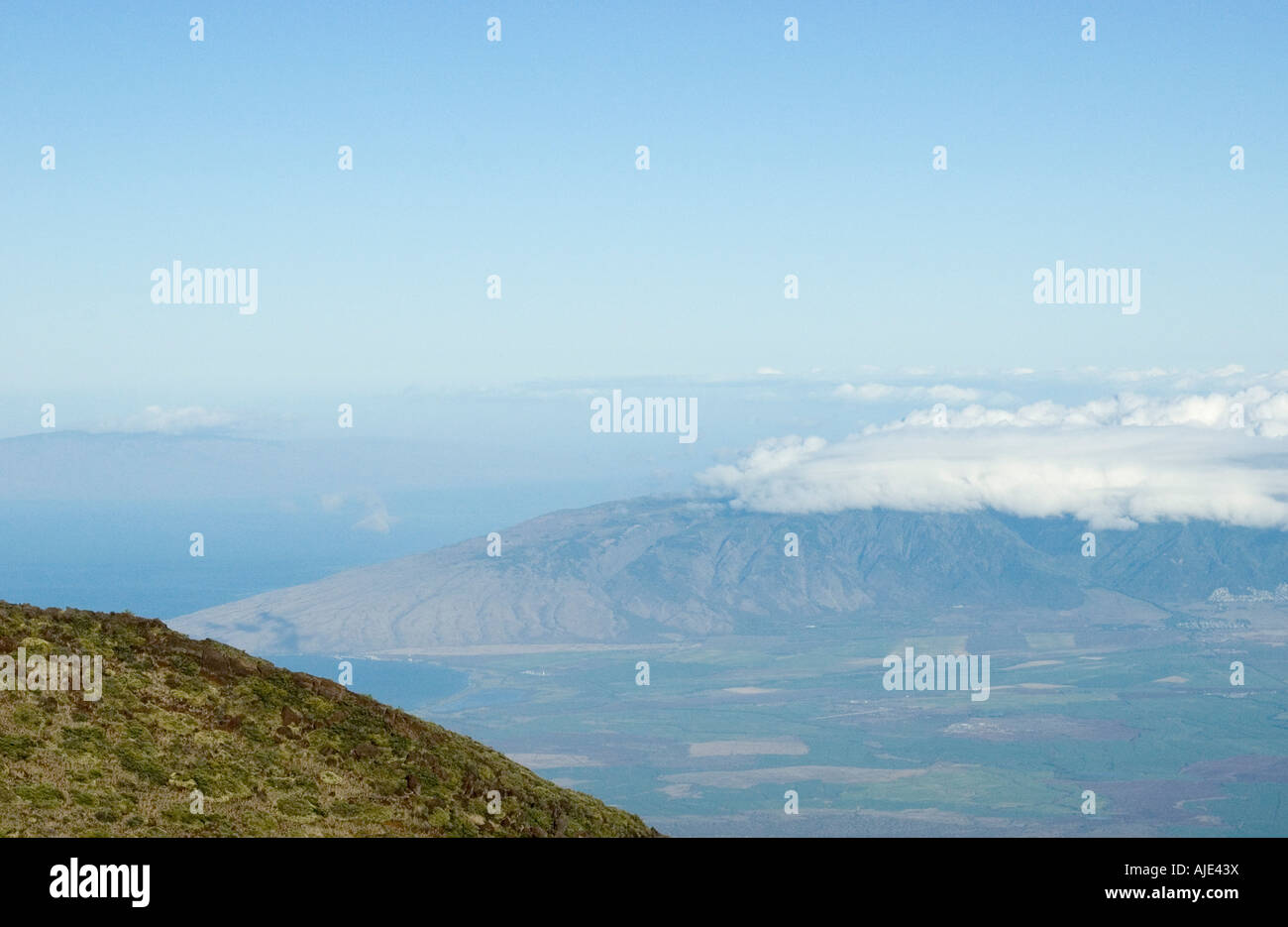 Sunrise (dawn) and view of West Maui and Lanai seen from the summit of ...