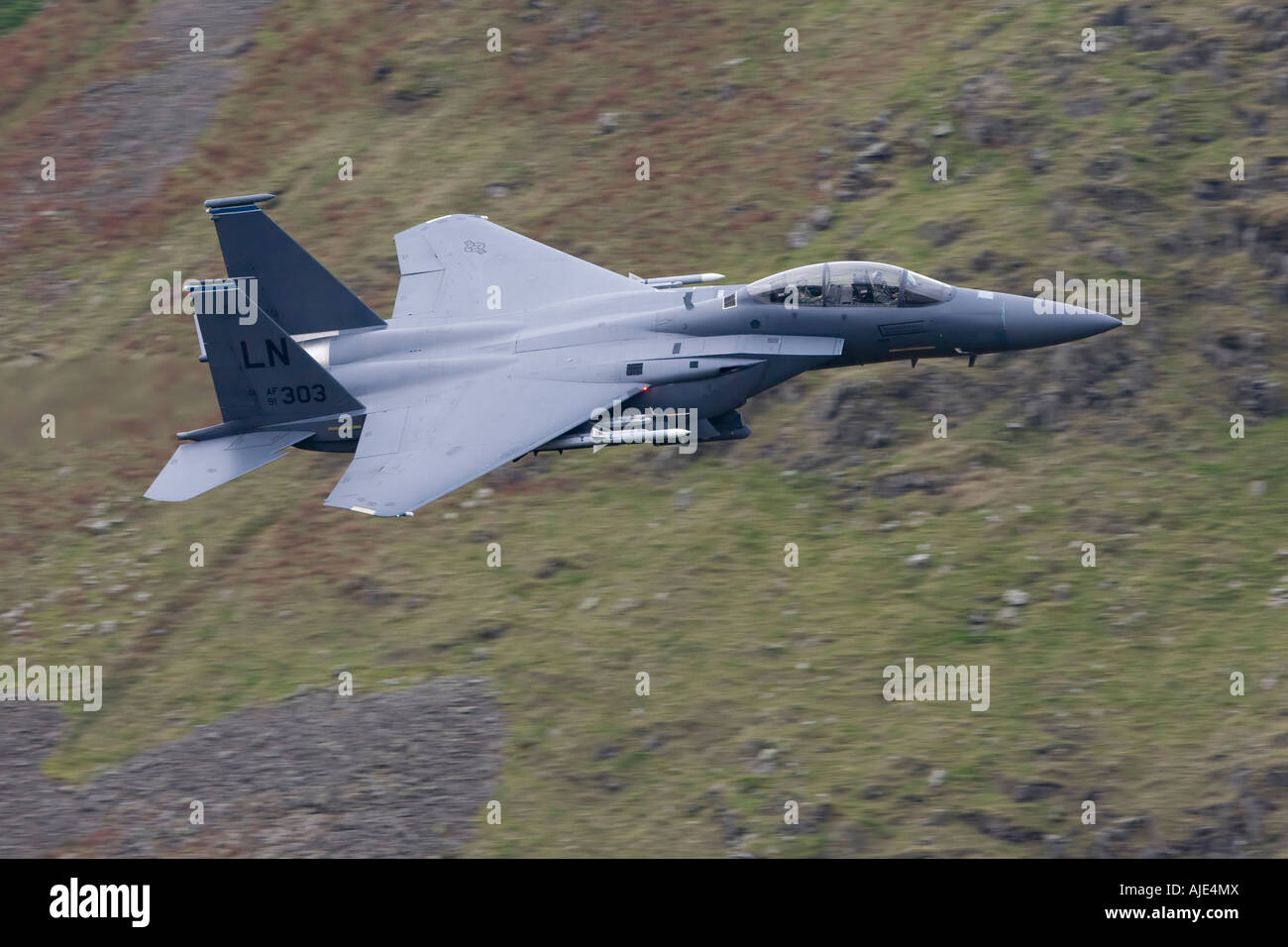 A USAF F-15 Eagle flies low level through the Lake District Stock Photo ...