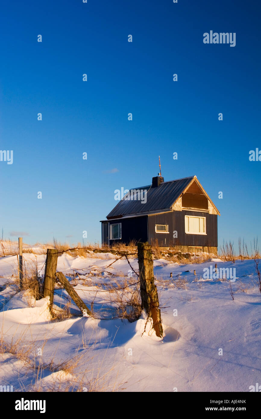 old house standing on a snowy hill in winter Stock Photo - Alamy