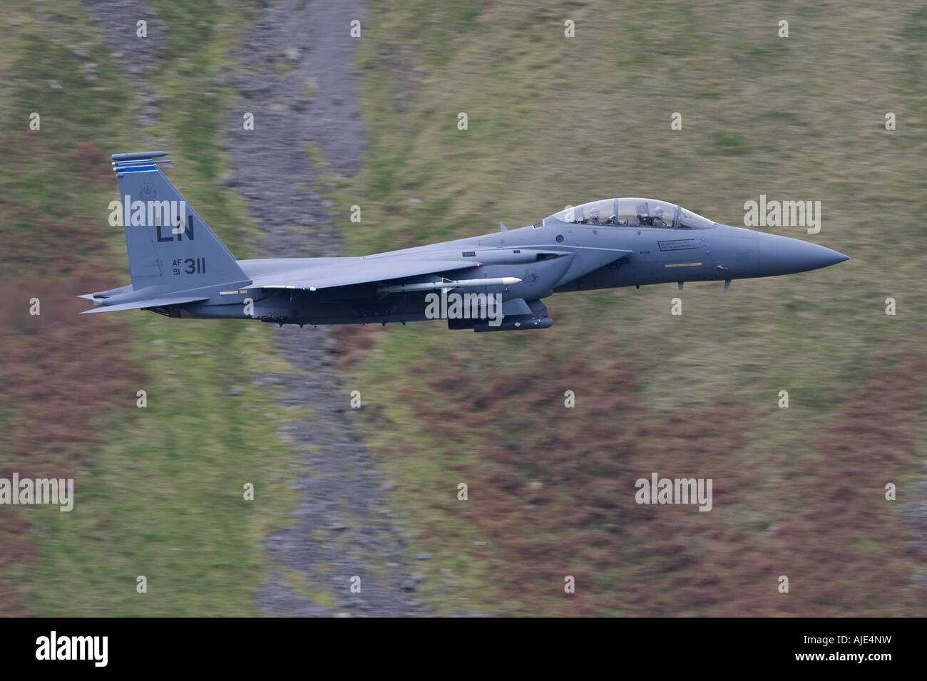 A USAF F-15 Eagle flies low level through the Lake District Stock Photo ...