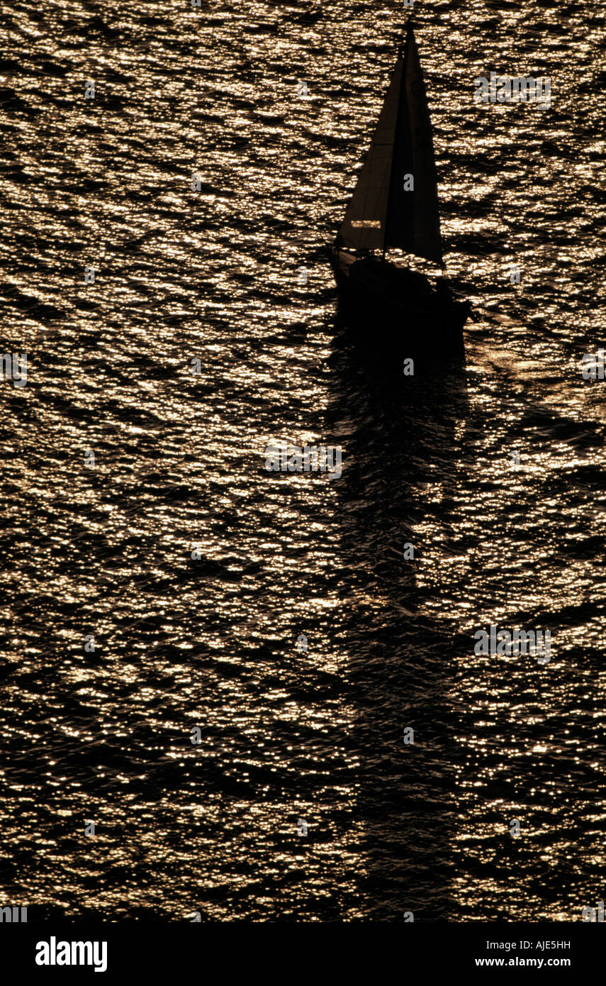 Sailboat silhouette and shadow, Lake Travis, Austin, Texas Stock Photo ...