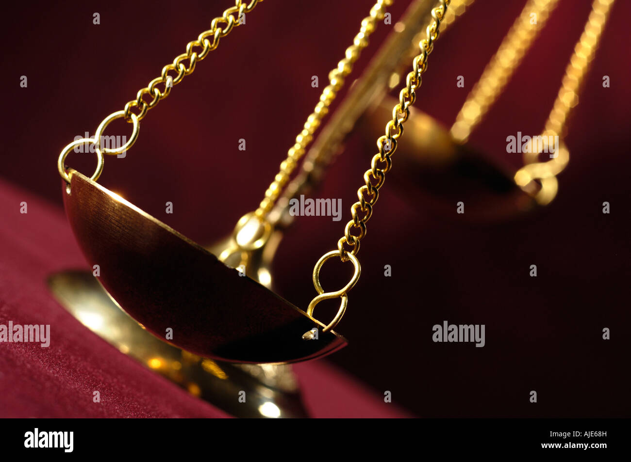 Shiny golden empty unbalanced vintage justice scales close up Stock ...