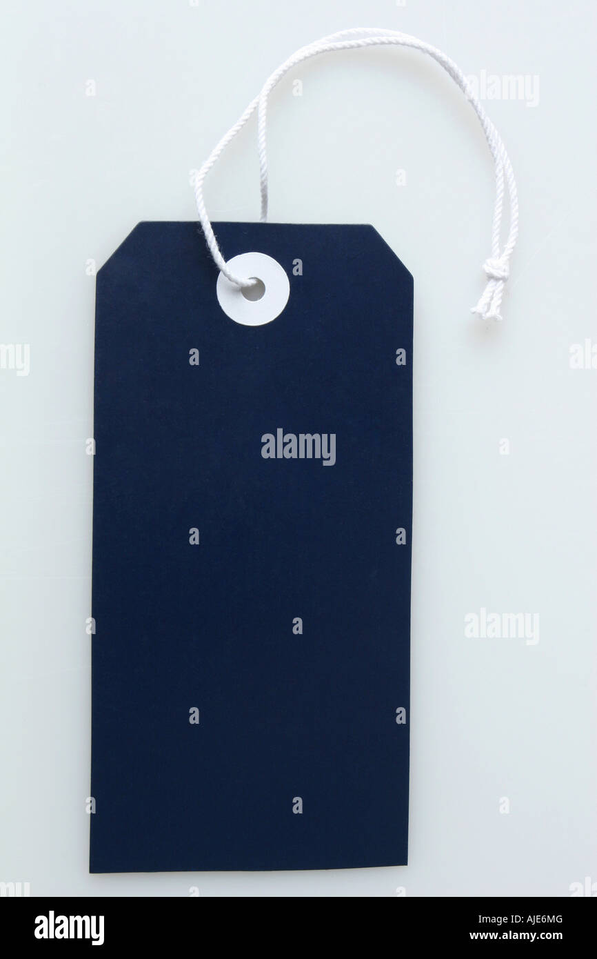 a blank dark blue label tag with string attached Stock Photo - Alamy