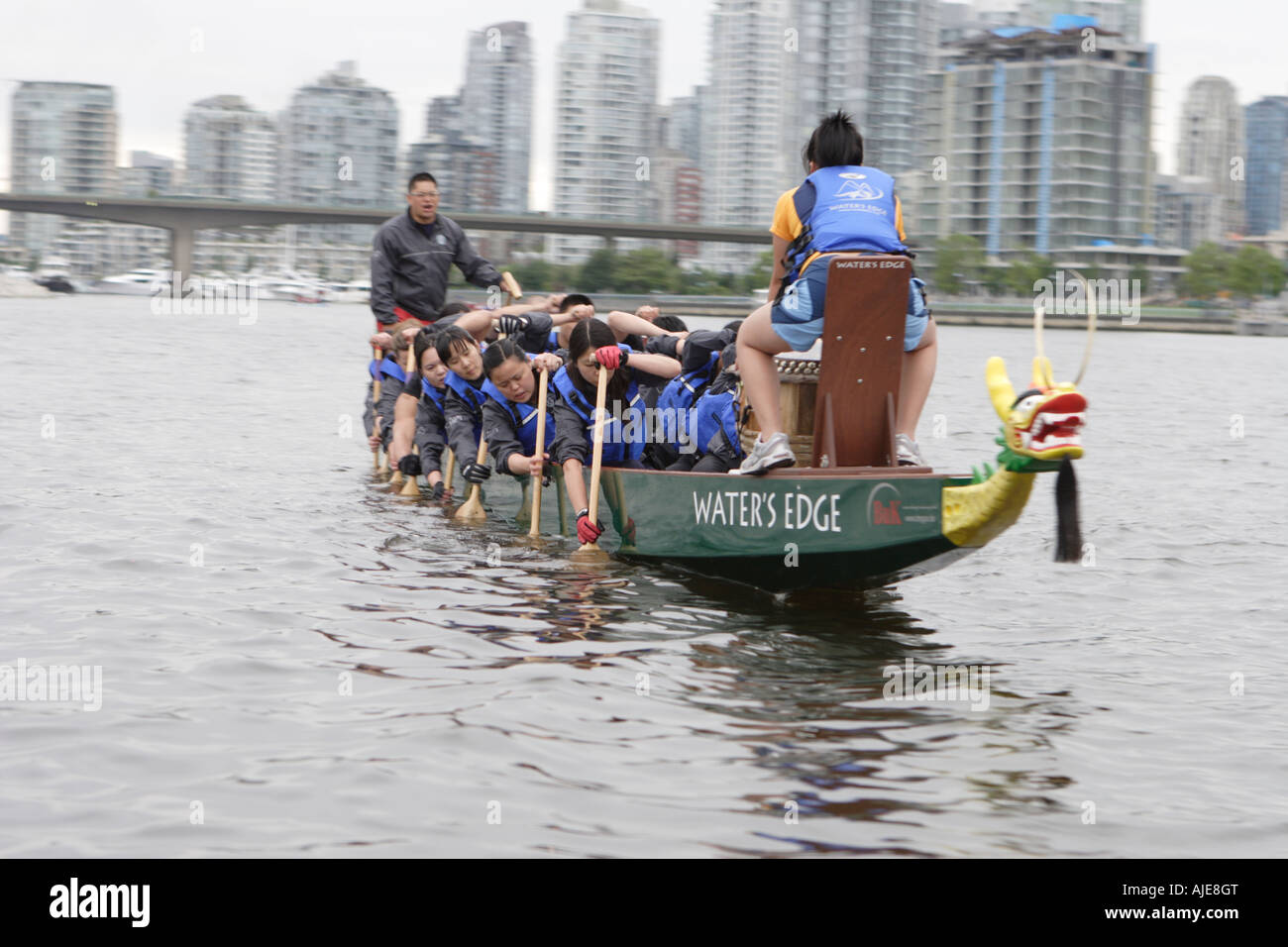 Team dragon boat racing, working together Stock Photo - Alamy