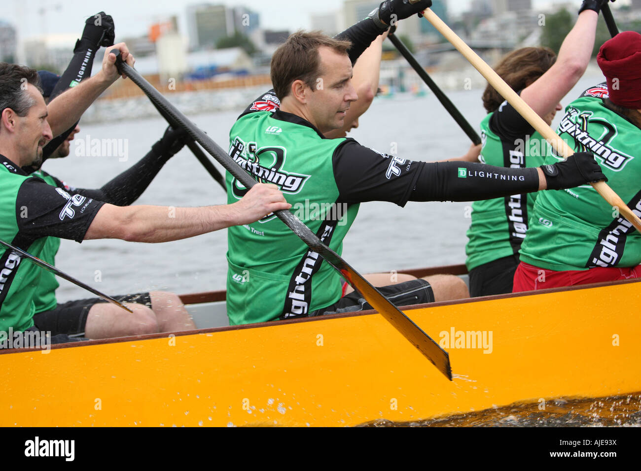Team dragon boat racing, working together Stock Photo - Alamy
