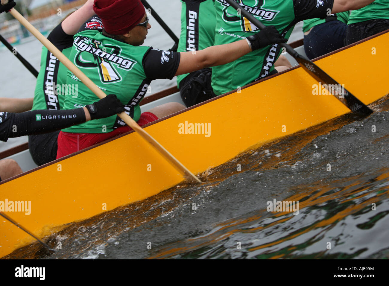 Team dragon boat racing, working together Stock Photo - Alamy