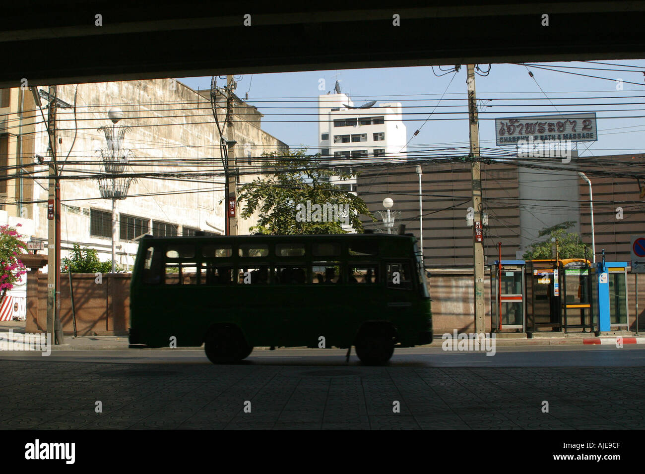 Local Bus travelling under an under pass in Bangkok Thailand Stock ...