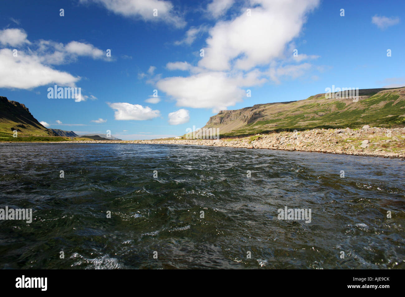 Wide angle shot of a scenic valley shot in the middle of a river ...