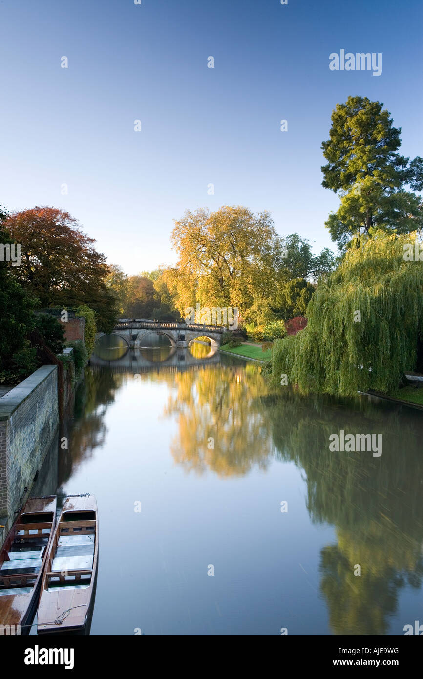 Ancient Clare bridge with autumn colours and reflections bathed in ...