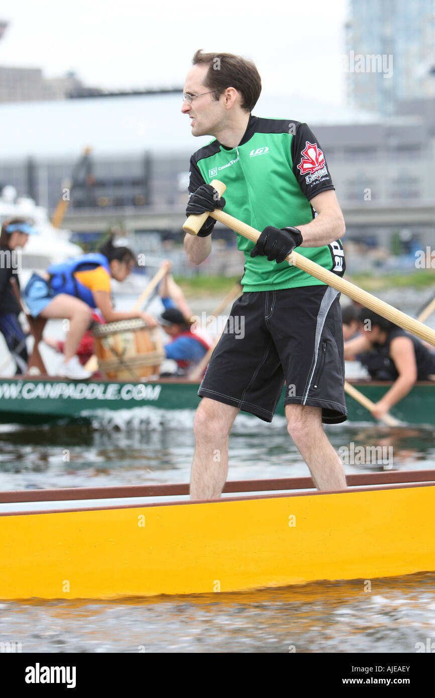 Team dragon boat racing, working together Stock Photo - Alamy