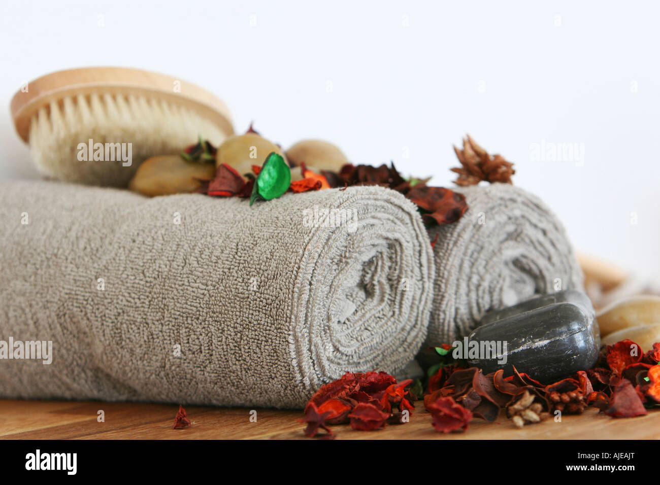 A still live of spa items set up on solid oak very soothing eartly ...