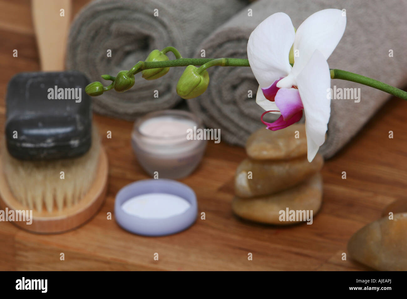 A still live of spa items set up on solid oak very soothing eartly ...