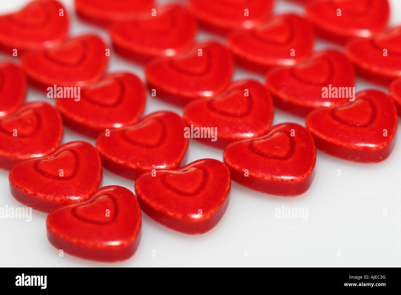 A close up of very red heart shaped candies Stock Photo - Alamy
