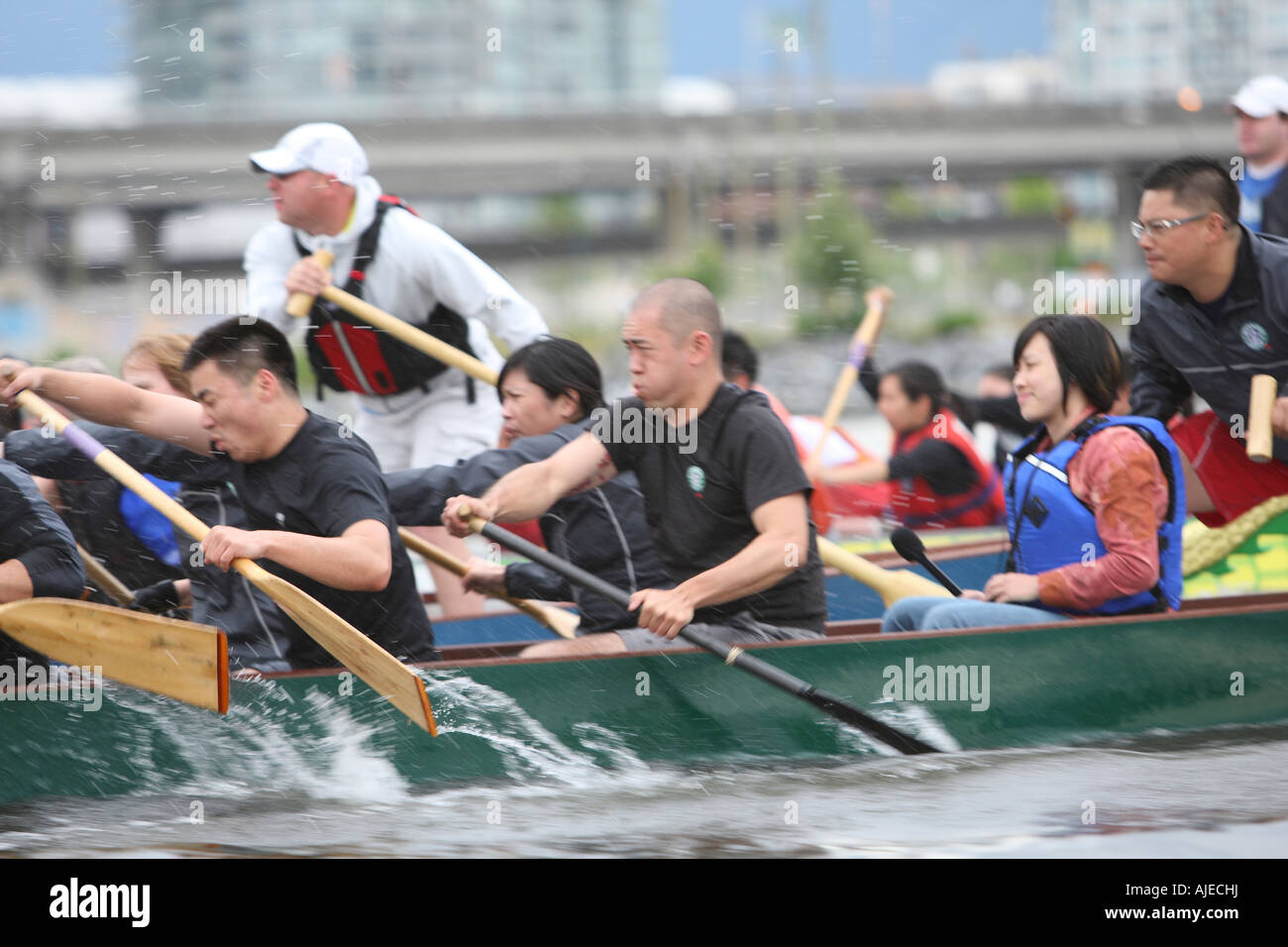 Team dragon boat racing, working together Stock Photo - Alamy
