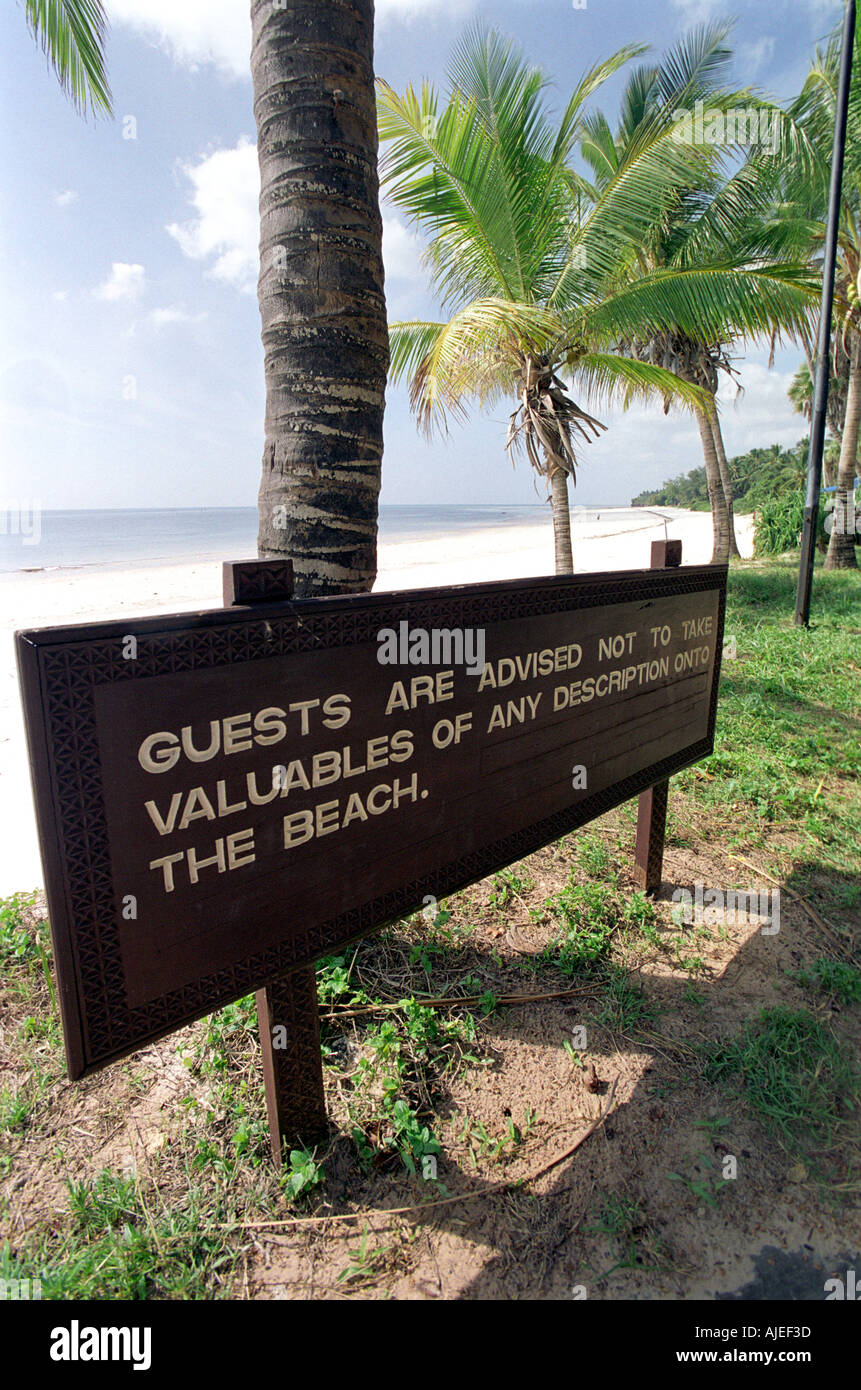 Warning sign advising tourists not to take valuables onto the beach in ...