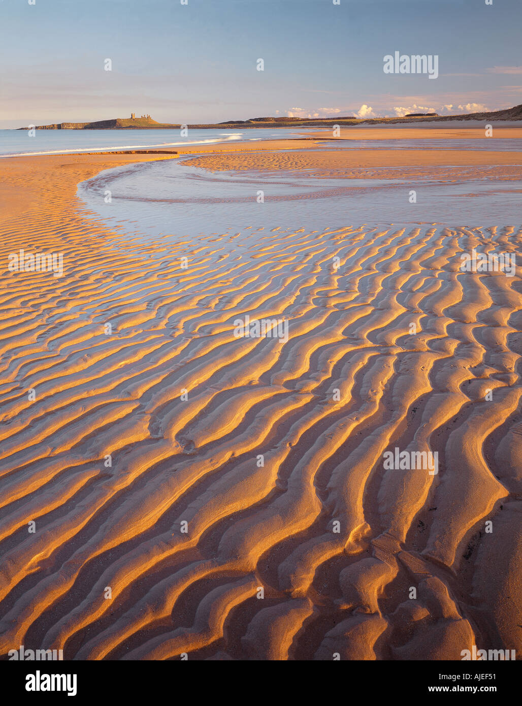 Dunstanburgh Castle from Embleton Beach Northumberland Stock Photo - Alamy