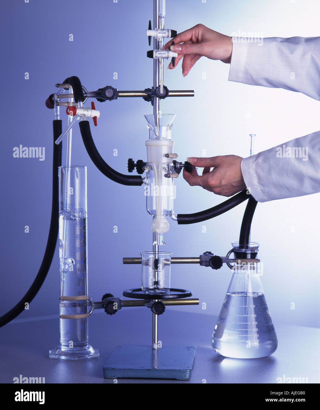 hands of female lab technician handling laboratory instruments Stock ...