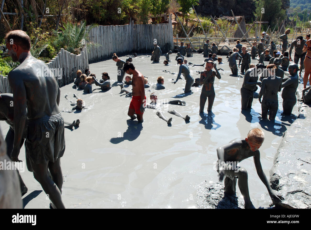 Tourists during mud bath near Dalyan village and Koycegiz lake in ... Tourists during mud bath near Dalyan village and Koycegiz lake in ...