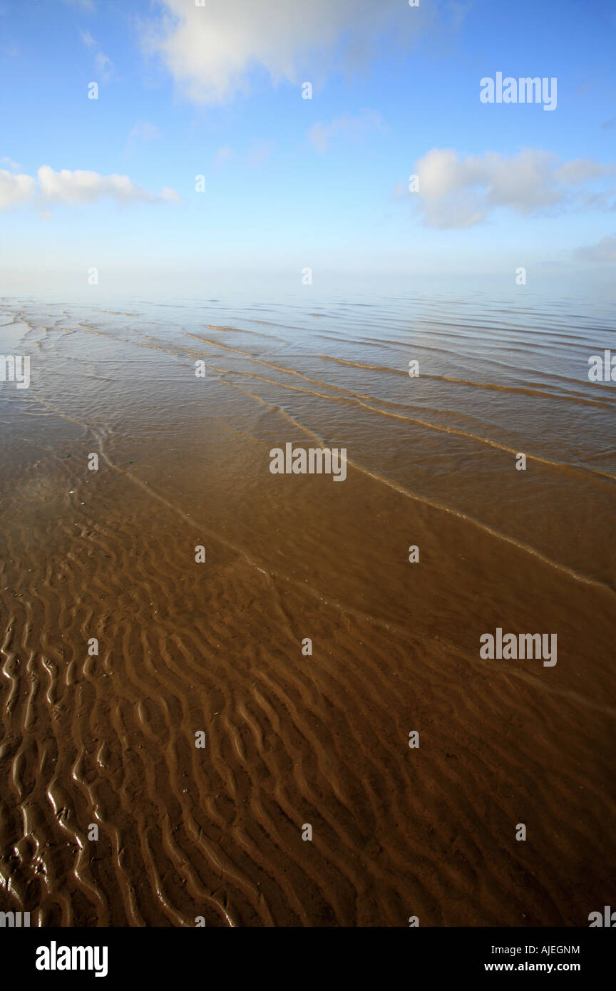 Very calm sea, blue sky with white clouds Stock Photo - Alamy