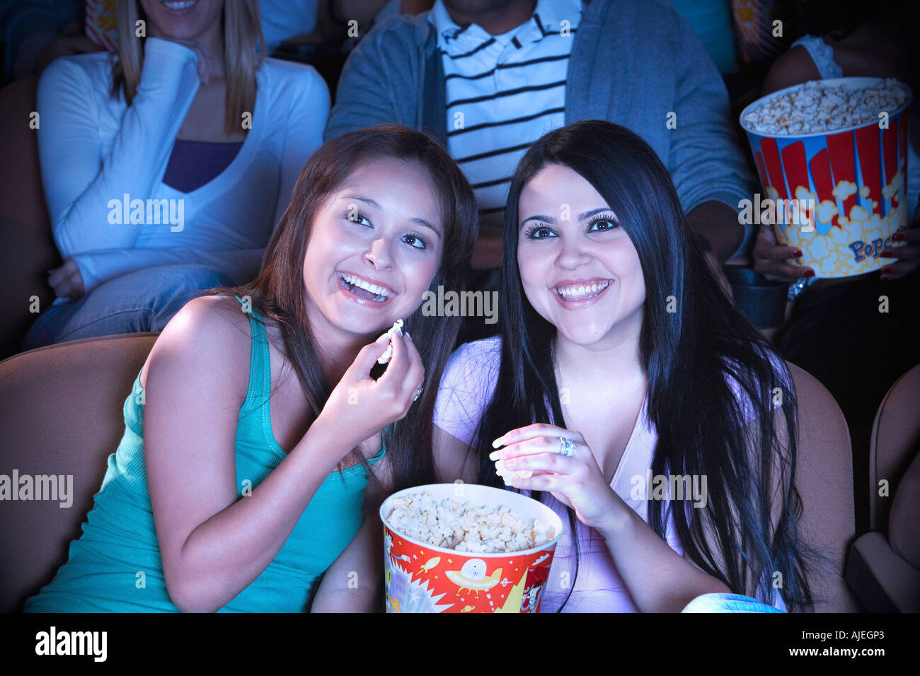 Sharing popcorn cinema hi-res stock photography and images - Alamy