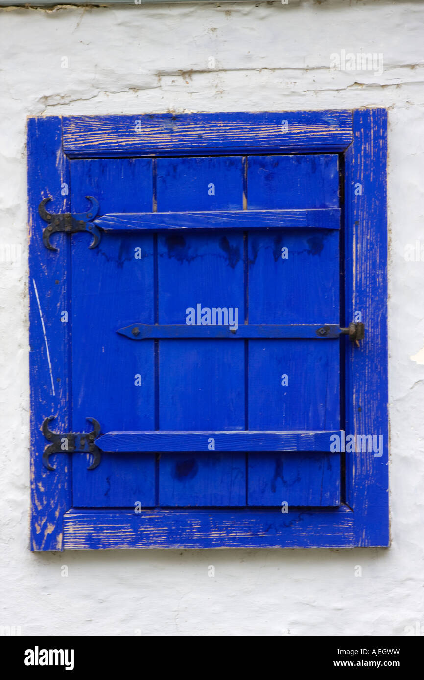 Blue antique window with tarnished frame Stock Photo - Alamy