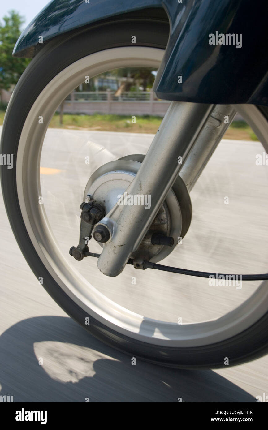Motor cycle front wheel at speed Thailand Stock Photo - Alamy