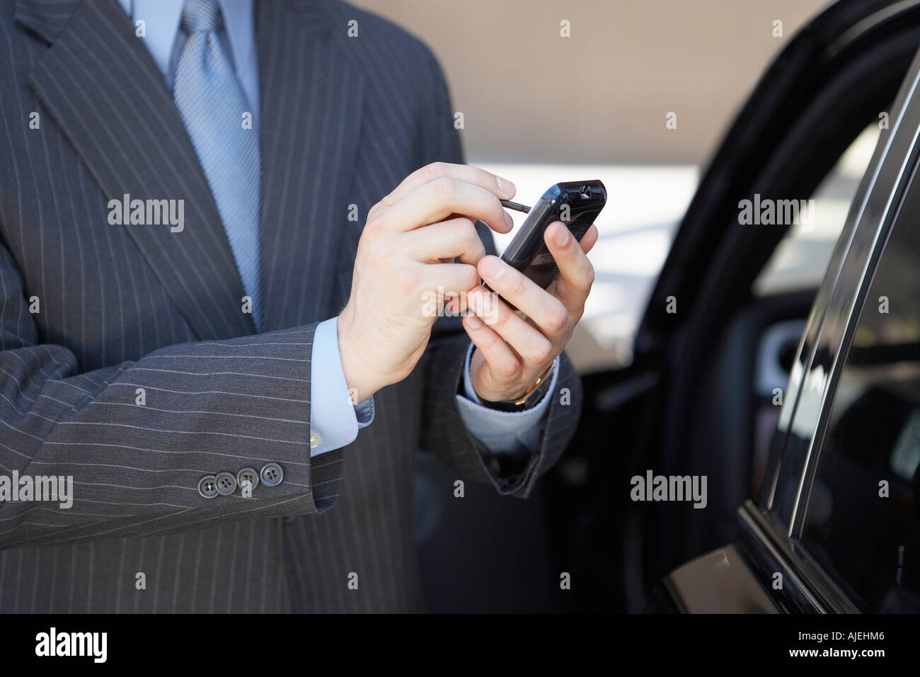 Businessman using pda hi-res stock photography and images - Alamy