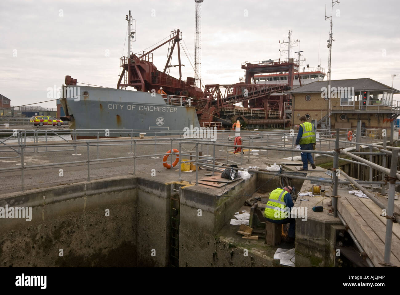 Workman Welding lock gates Stock Photo - Alamy