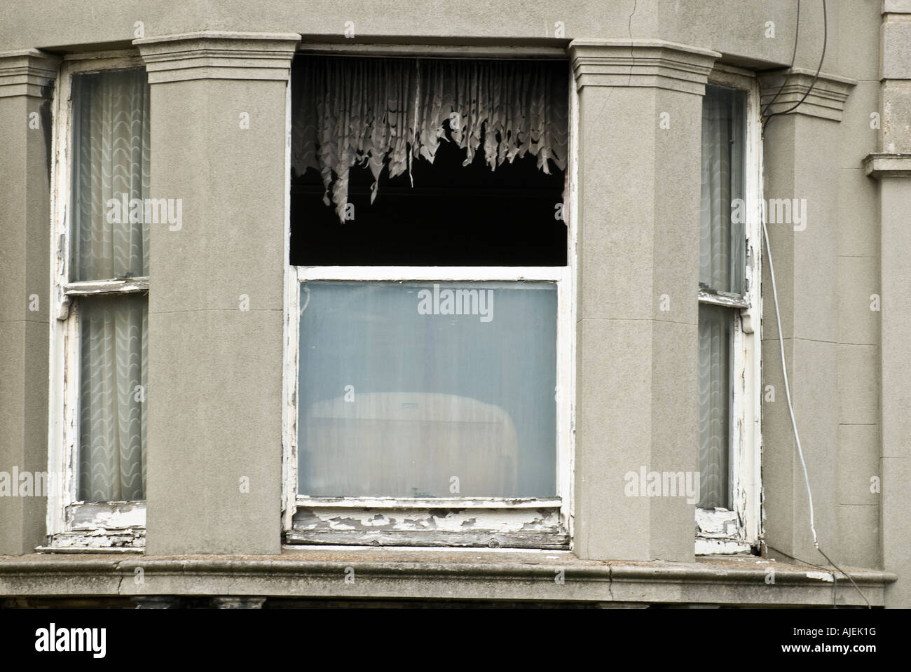 Torn curtains hi-res stock photography and images - Alamy