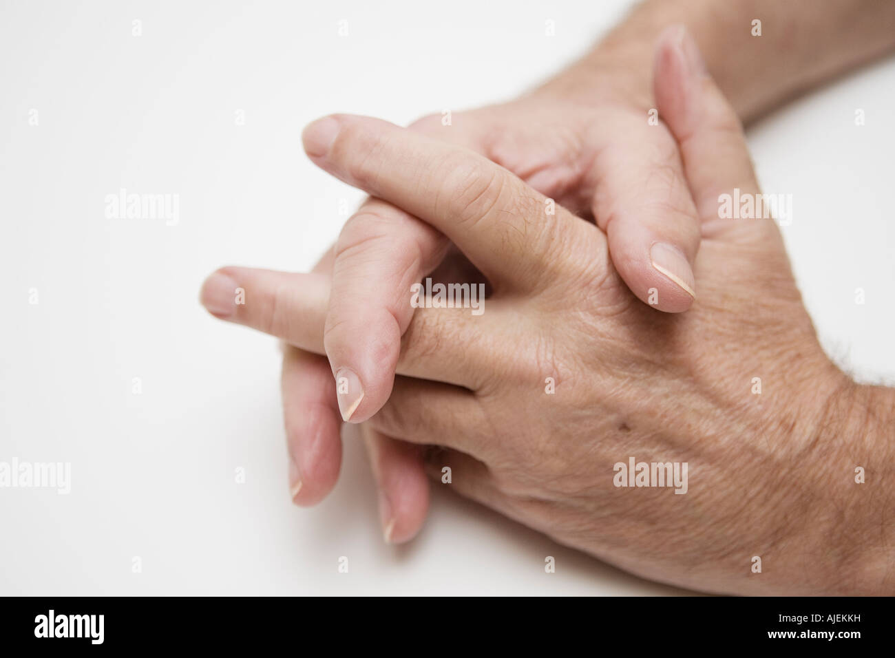 Folded hands of an old man Stock Photo - Alamy