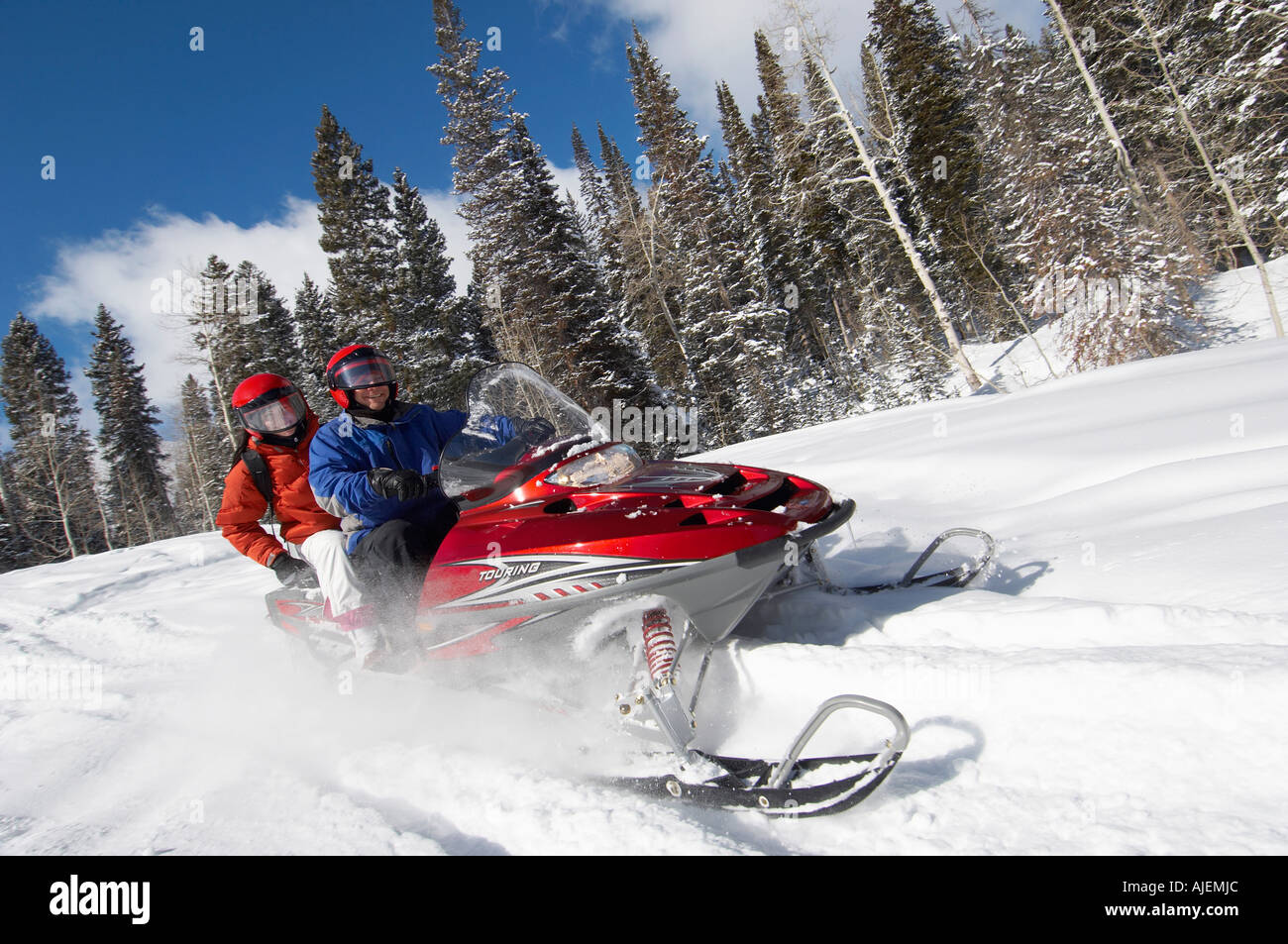 Driving snowmobile through snow hi-res stock photography and images - Alamy