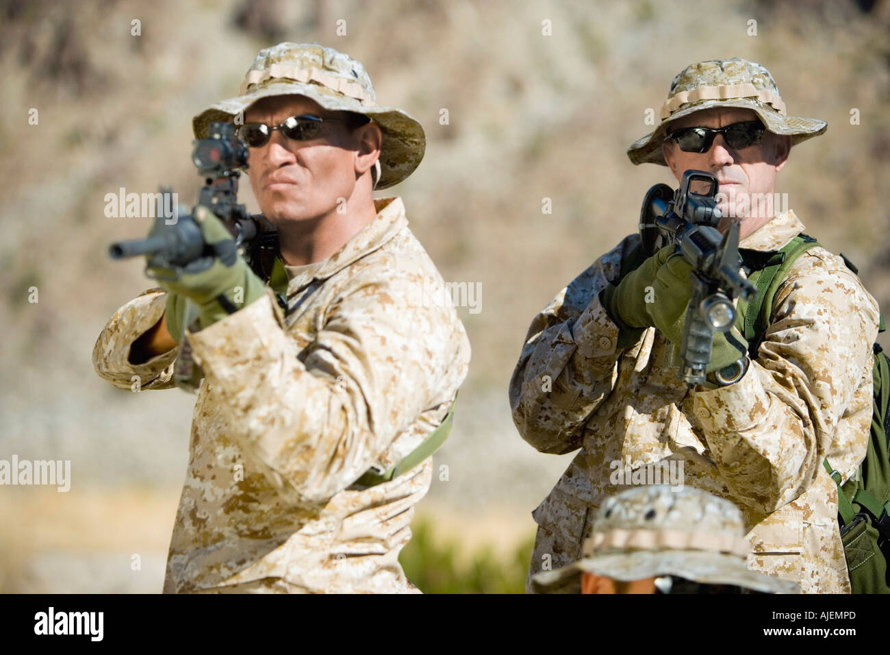 Armed soldiers standing side by side, outdoors Stock Photo - Alamy