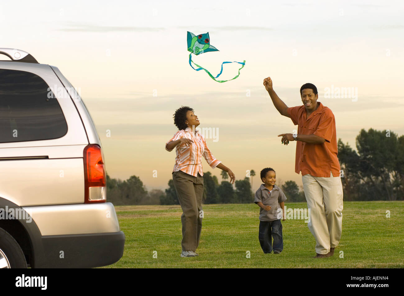 Family in flying car hi-res stock photography and images - Alamy