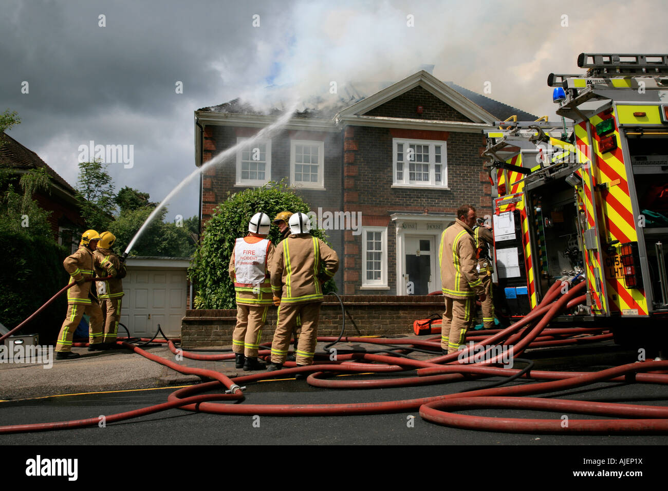 Firemen putting out a housefire in tunbridge wells kent england united ...