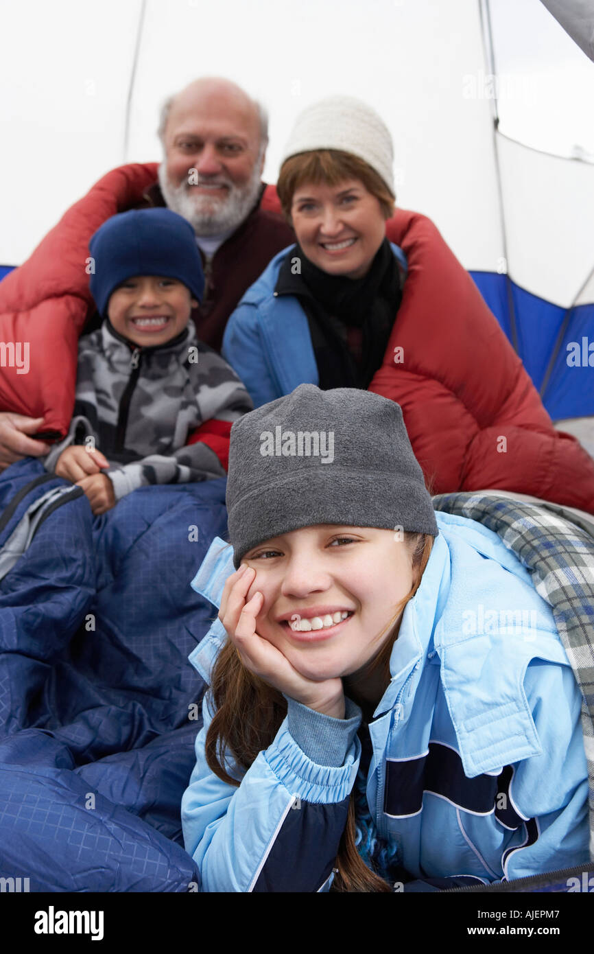 Grandparents and grandchildren (7-12) in tent, (portrait Stock Photo ...