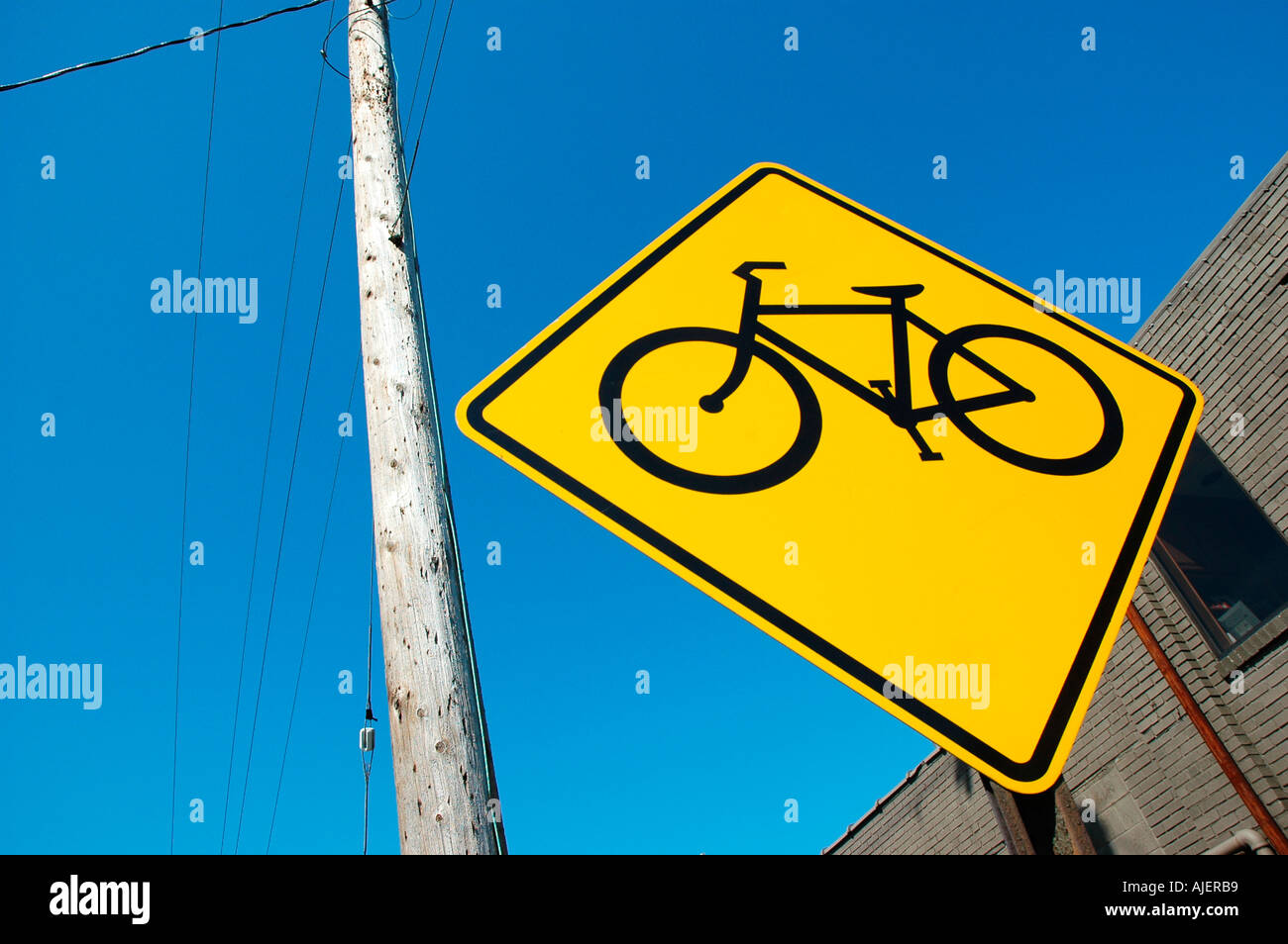 Bike Crossing alert sign on public roadway where bikes are common in ...