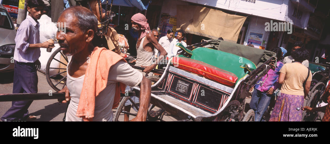 Man pulling rickshaw hi-res stock photography and images - Alamy
