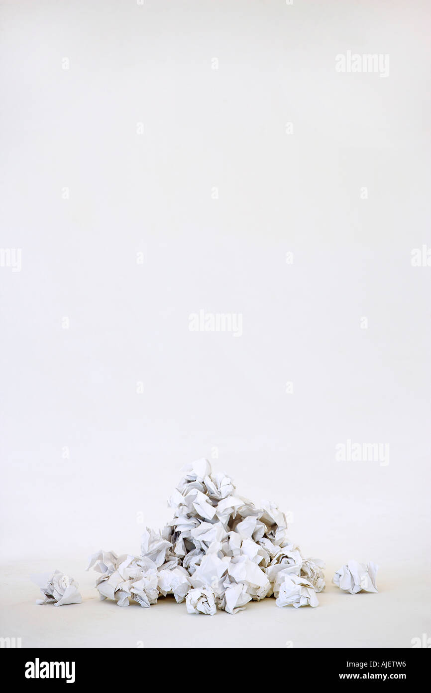 Pile of crumpled paper, on white background Stock Photo - Alamy