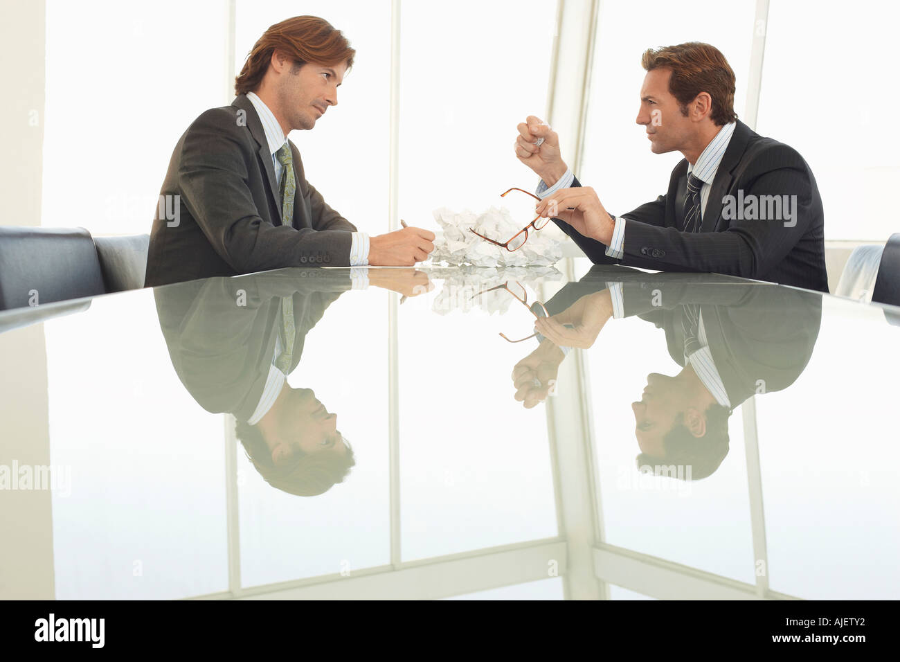 Angry businessmen in office meeting Stock Photo - Alamy