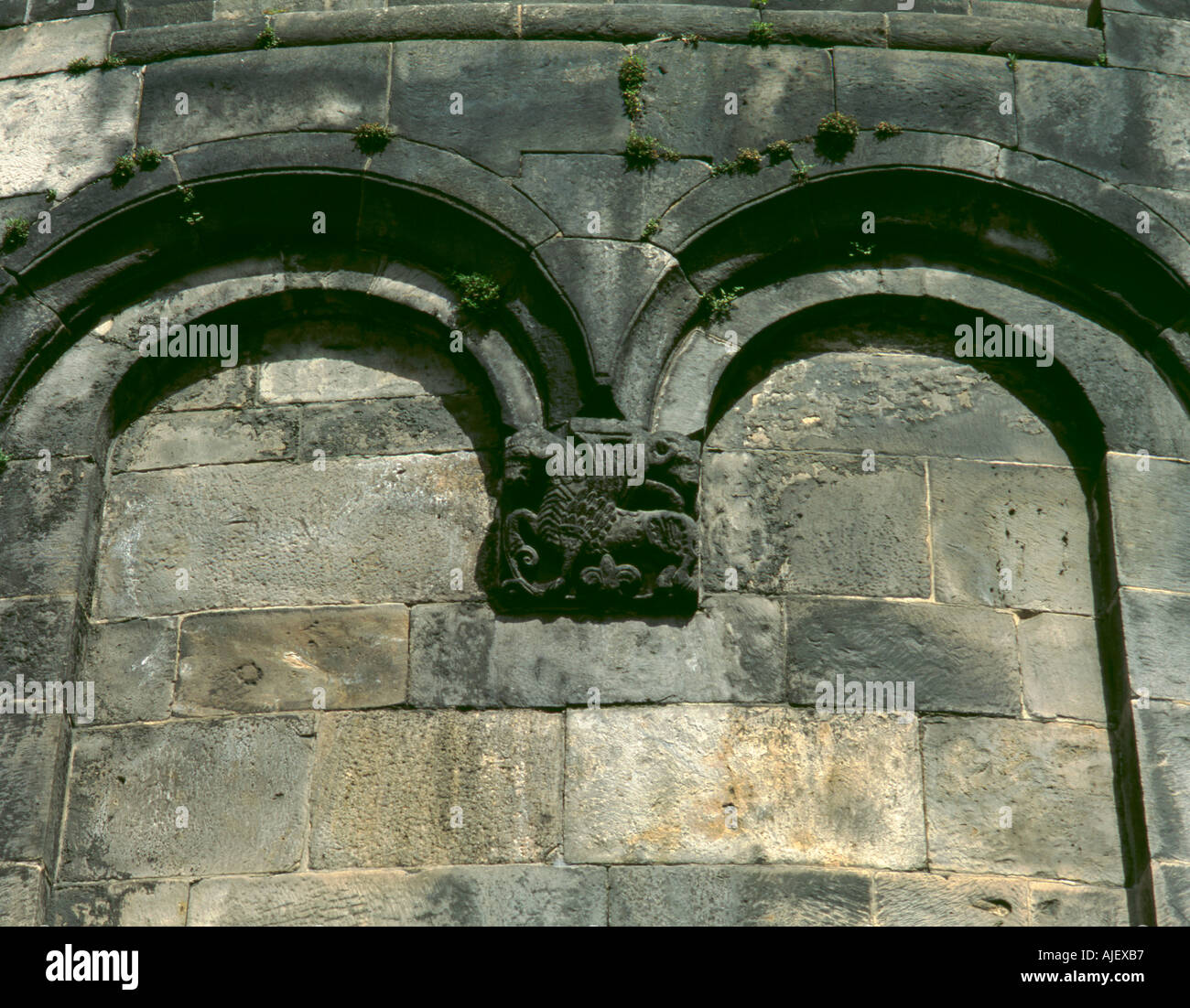 Detail of blind arcading depicting a mythical beast eastern facade of ...