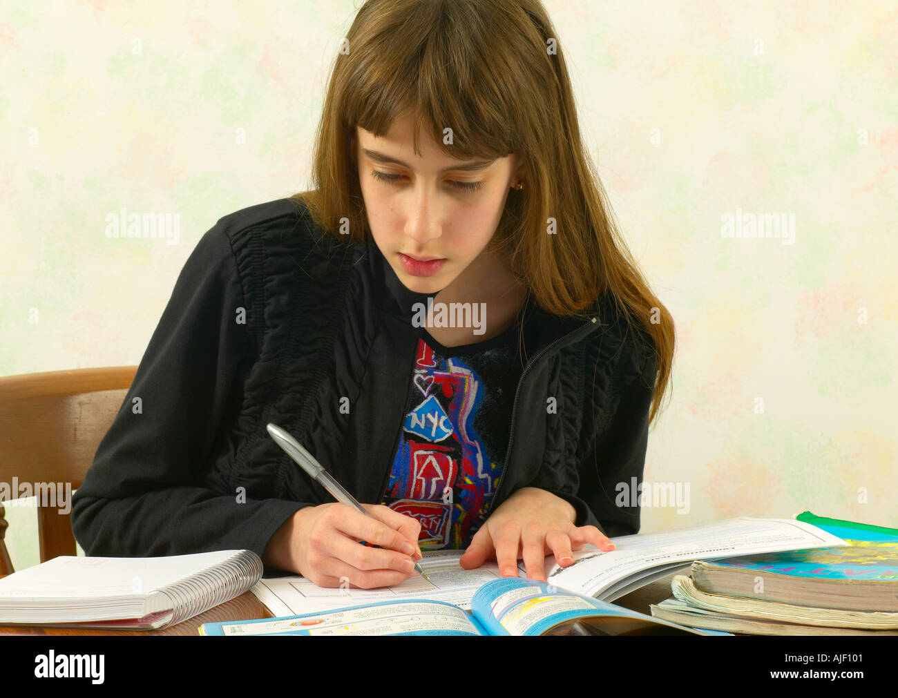 teenager studying at home with school homework Stock Photo - Alamy