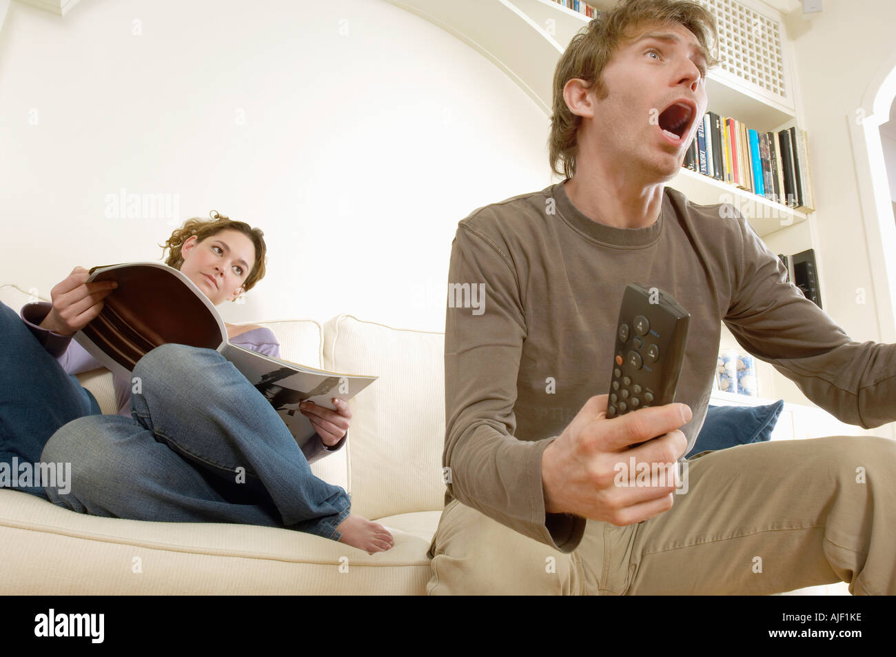 Tv remote and magazine hi-res stock photography and images - Alamy