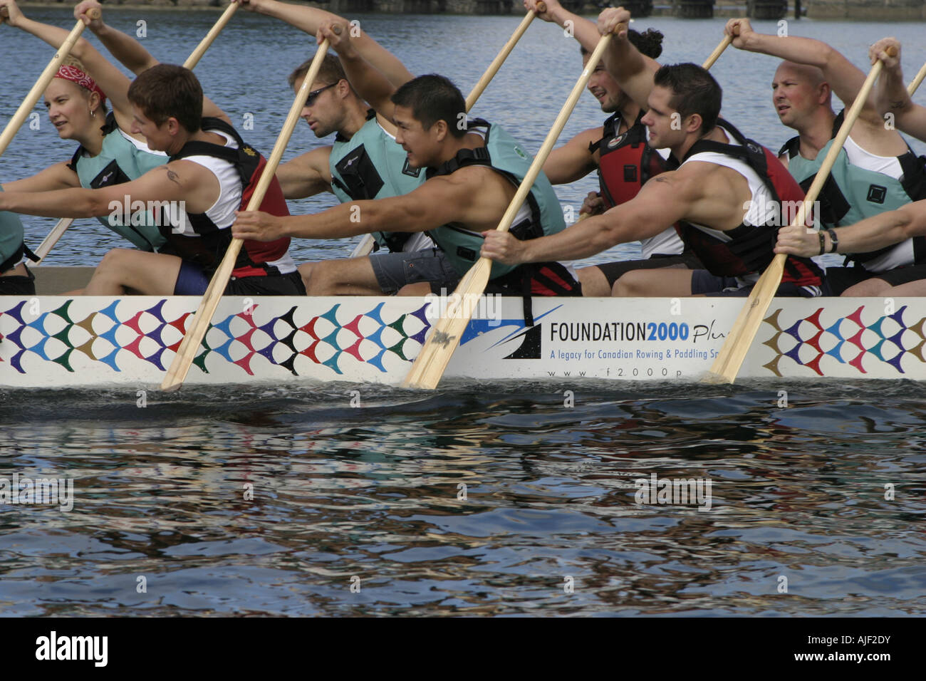 dragon boat team racing Stock Photo - Alamy