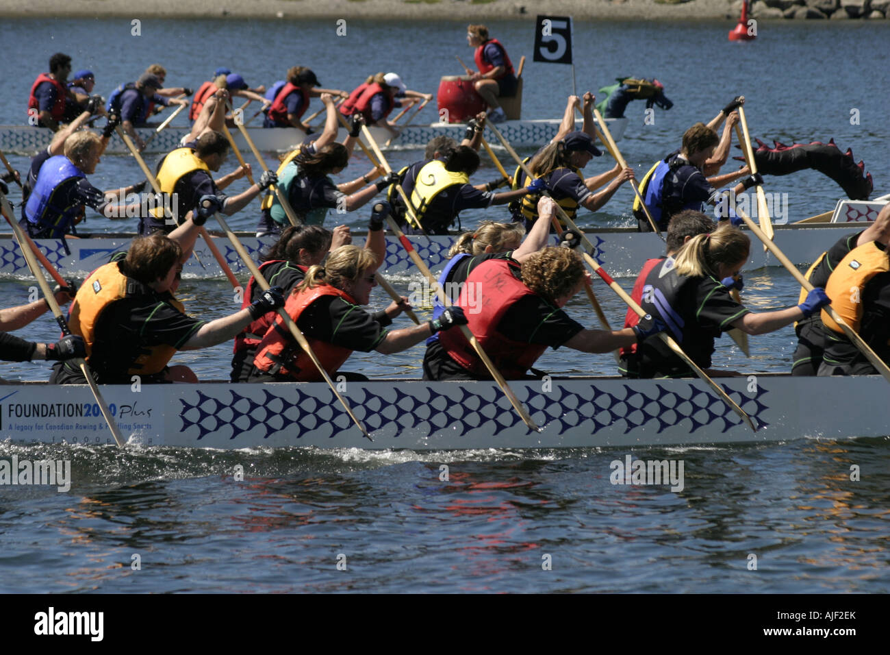 dragon boat team racing Stock Photo - Alamy