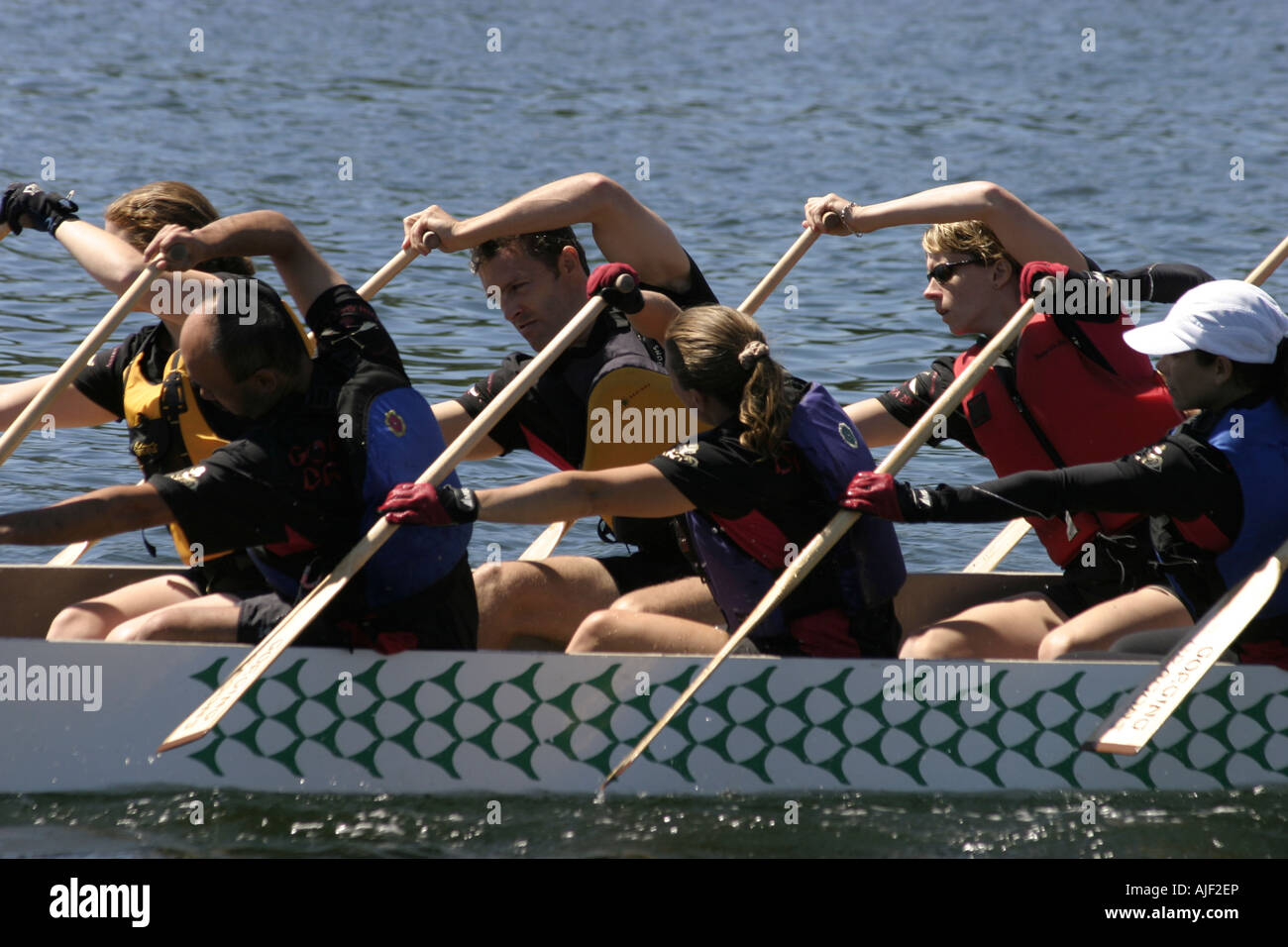 dragon boat team racing Stock Photo - Alamy