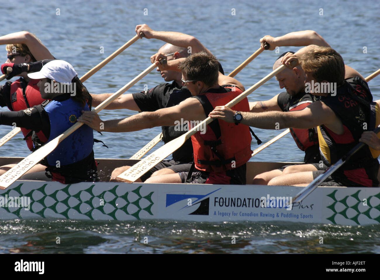dragon boat team racing Stock Photo - Alamy